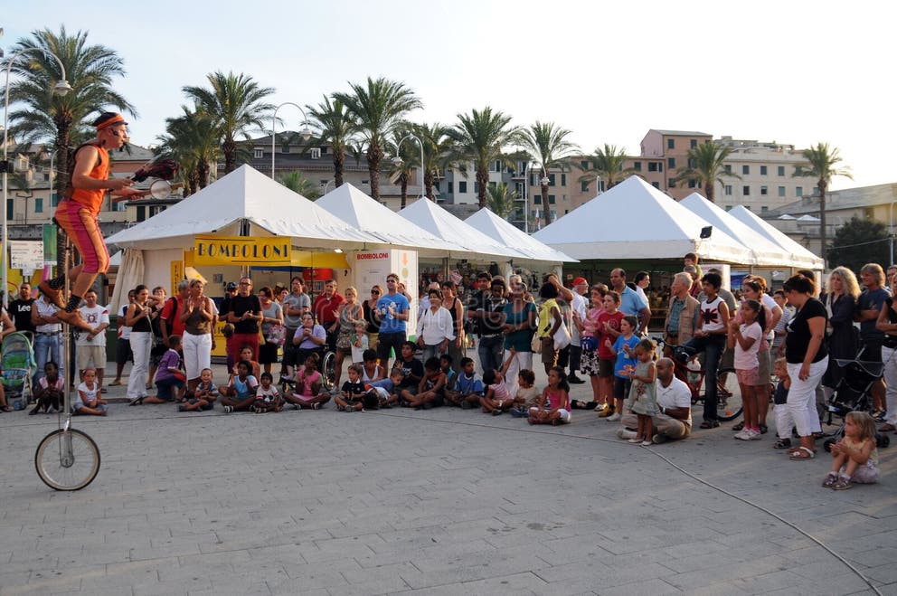 An Acrobat on a Unicycle in Front of the Crowd Editorial Stock Photo ...