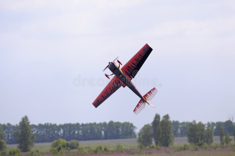 Acrobatic Maneuvers. Radio Controlled Airplane Flying in the Sky Stock ...