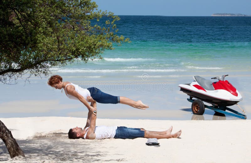 Acrobatic at ocean stock image. Image of woman, couple - 29436599
