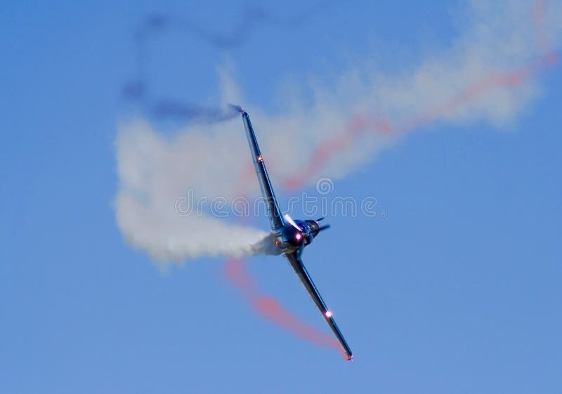 Acrobatic Plane Doing Loops Stock Photo - Image of puff, acrobation ...