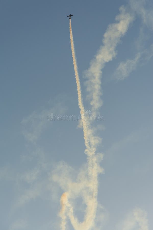 Acrobatic Plane Flying in the Sky Stock Image - Image of smoke, trace ...