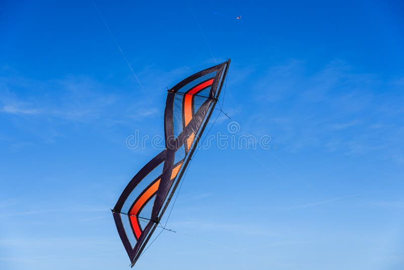 Acrobatic Stunt Kite Flying in the Blue Sky Stock Image - Image of ...