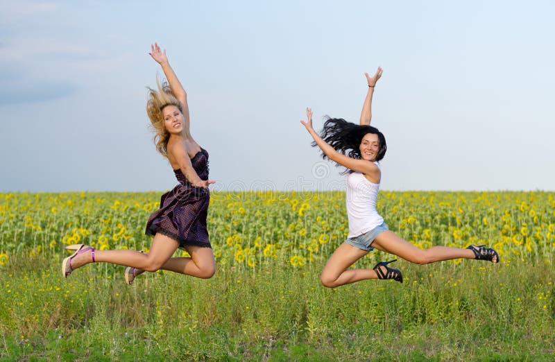 Acrobatic Women Leaping in Unison Stock Photo - Image of freedom, women ...