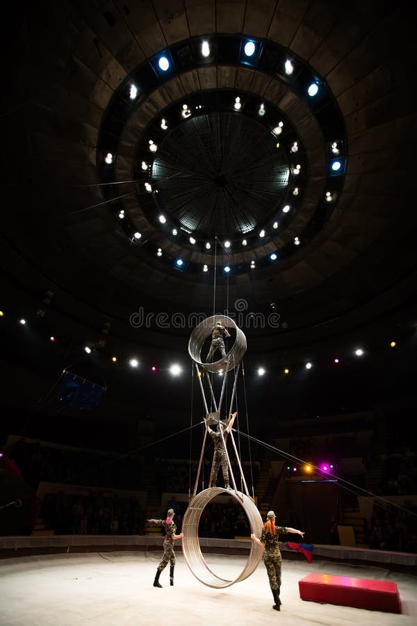 Acrobats in the Circus Perform a Complex Trick. Editorial Image - Image ...