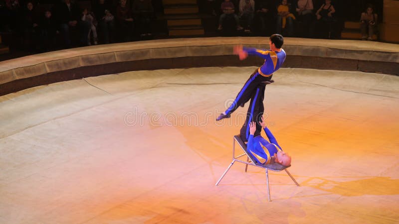 Acrobats Perform a Difficult Trick in the Circus Stock Footage - Video ...