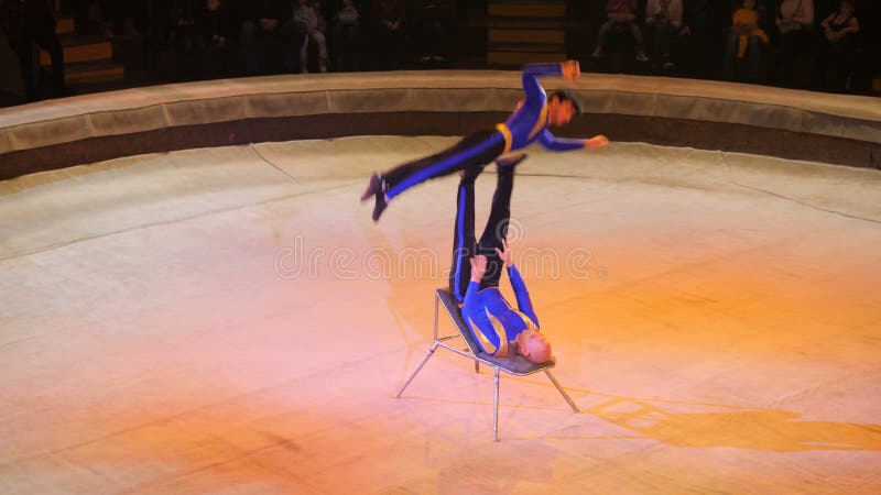 Acrobats Perform a Difficult Trick in the Circus Stock Footage - Video ...