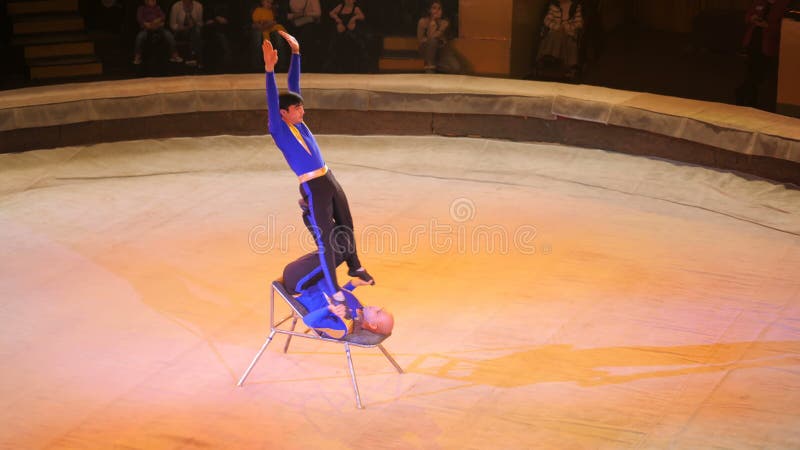 Acrobats Perform a Difficult Trick in the Circus Stock Footage - Video ...