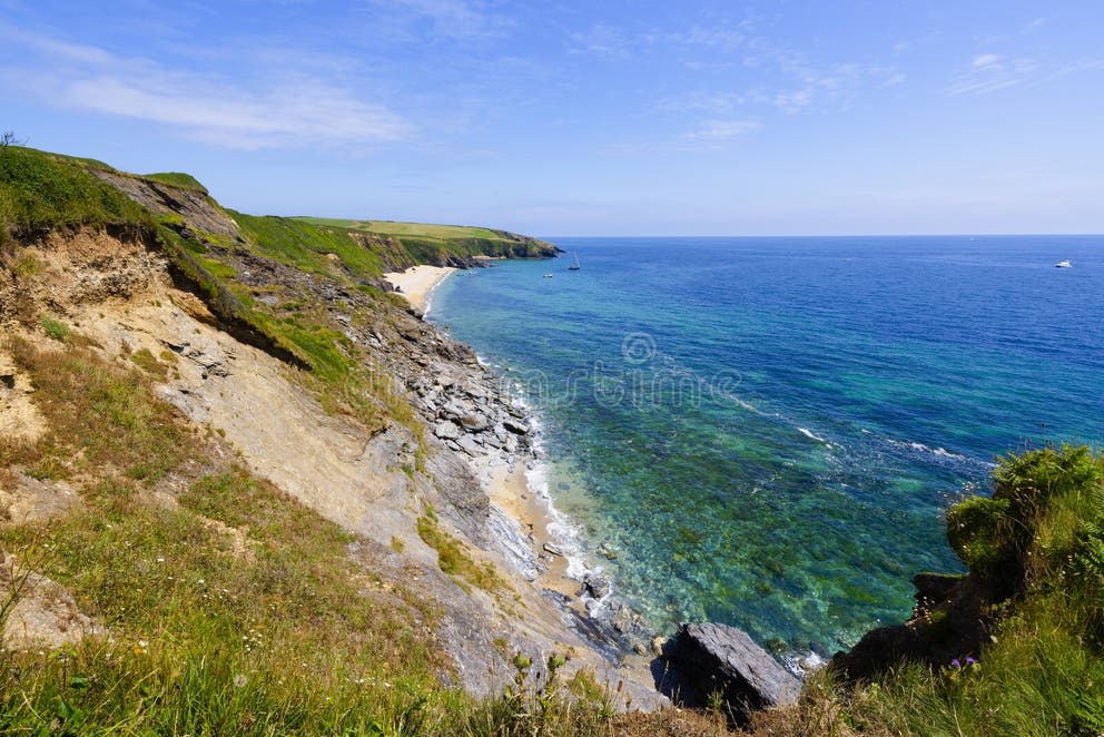 Across Eroding Cliffs Down To a Secluded Porthbeor Beach. Stock Image ...