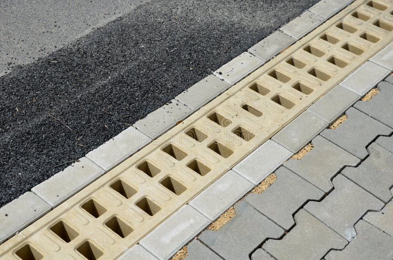 Across the Path There is a Channel with a Metal Grid for Drainage ...
