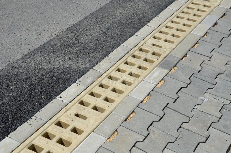 Across the Path There is a Channel with a Metal Grid for Drainage ...