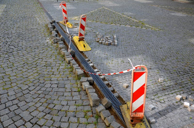 Across the Path There is a Channel with a Metal Grid for Drainage ...