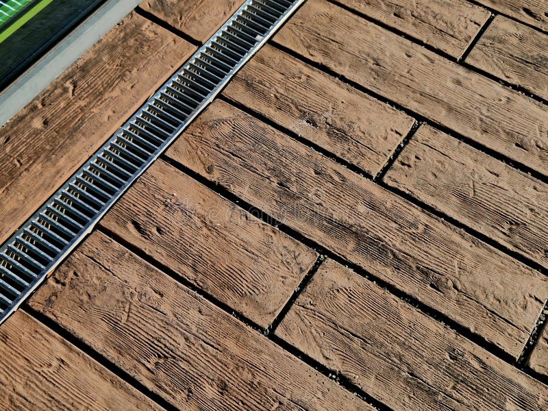 Across the Path There is a Channel with a Metal Grid for Drainage ...