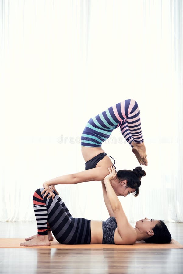 Acroyoga practice stock photo. Image of pretty, pier - 110804804