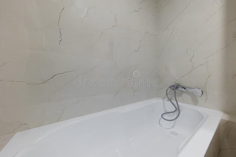 Acrylic Bathtub in the Bathroom Interior in Beige Tones Stock Image ...