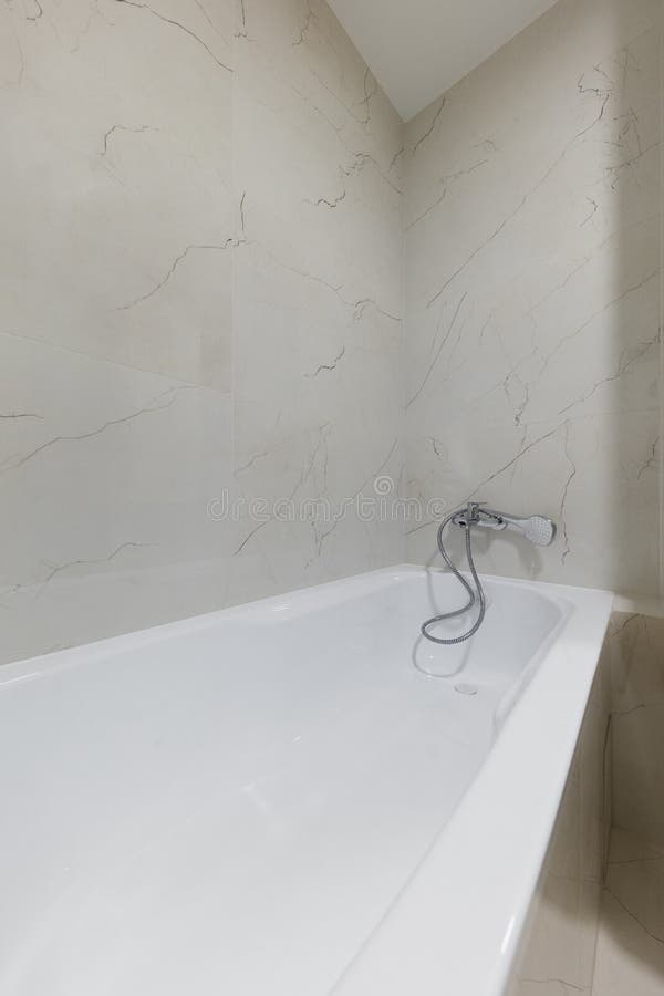 Acrylic Bathtub in the Bathroom Interior in Beige Tones Stock Photo ...
