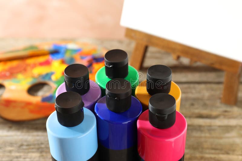 Acrylic Paints of Different Colors in Bottles on Table, Closeup Stock ...