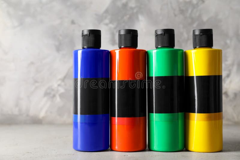 Acrylic Paints of Different Colors on Grey Table Stock Photo - Image of ...