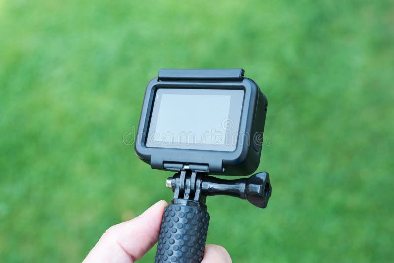 Action Camera Close-up on Stick. Blank Screen for Mockup Stock Photo ...