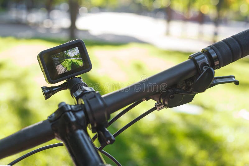 Action Camera with the Included Screen Mounted on the Handlebar of a ...