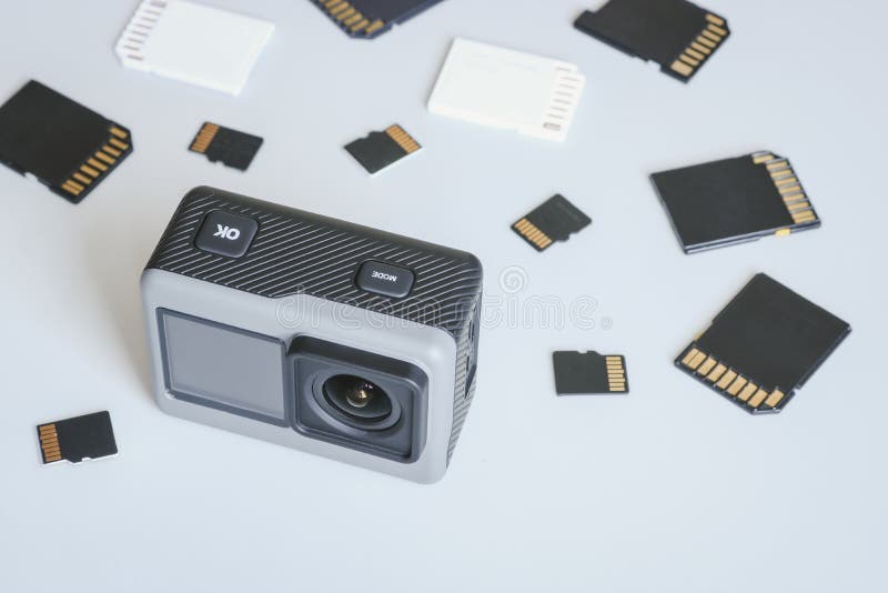 Action Camera and SD and MicroSD Memory Cards. Background from Gadgets ...