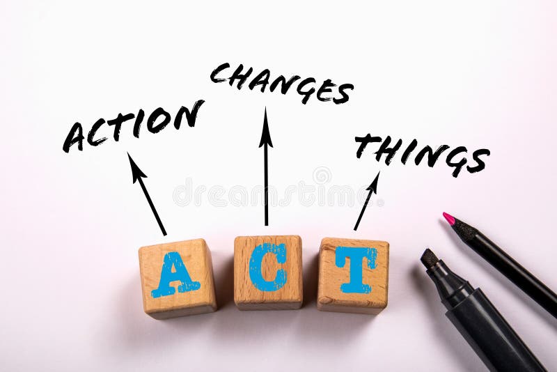 Action Changes Things. Wooden Blocks on a White Office Table Stock ...