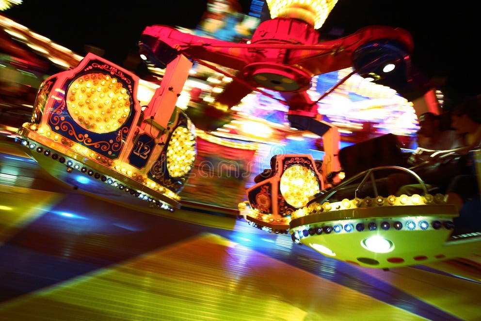 Action Photo of Riding a Merrygoround Stock Image - Image of funfair ...