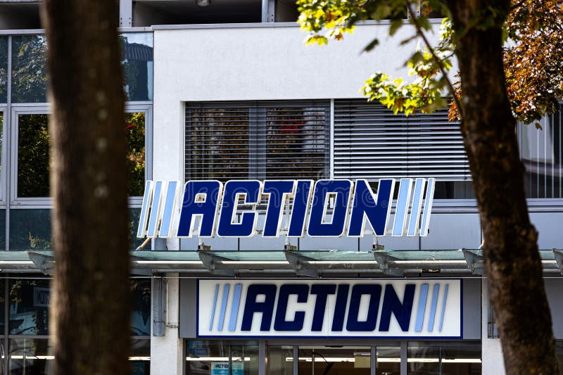 An action shop sign editorial stock photo. Image of logo - 336278678