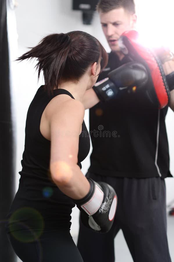 Action Shot of Girl with Personal Trainer Stock Image - Image of ...