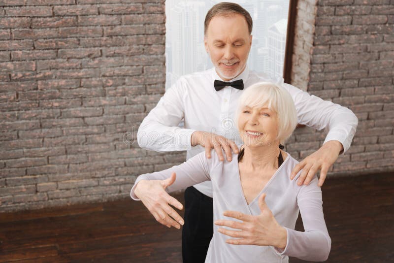 Active Aged Couple Performing in Interaction in the Dance Studio Stock ...