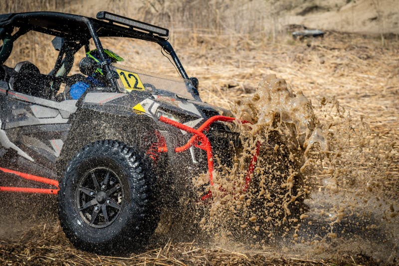Active ATV and UTV Off-Road Vehicle in Muddy Water. ATV 4x4 Stock Image ...
