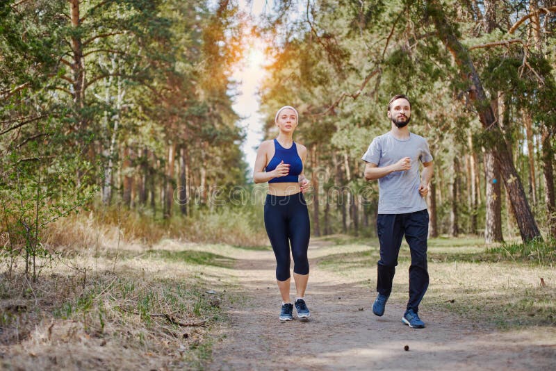 Active Beautiful People Jogging Outdoors in the Park Stock Image ...