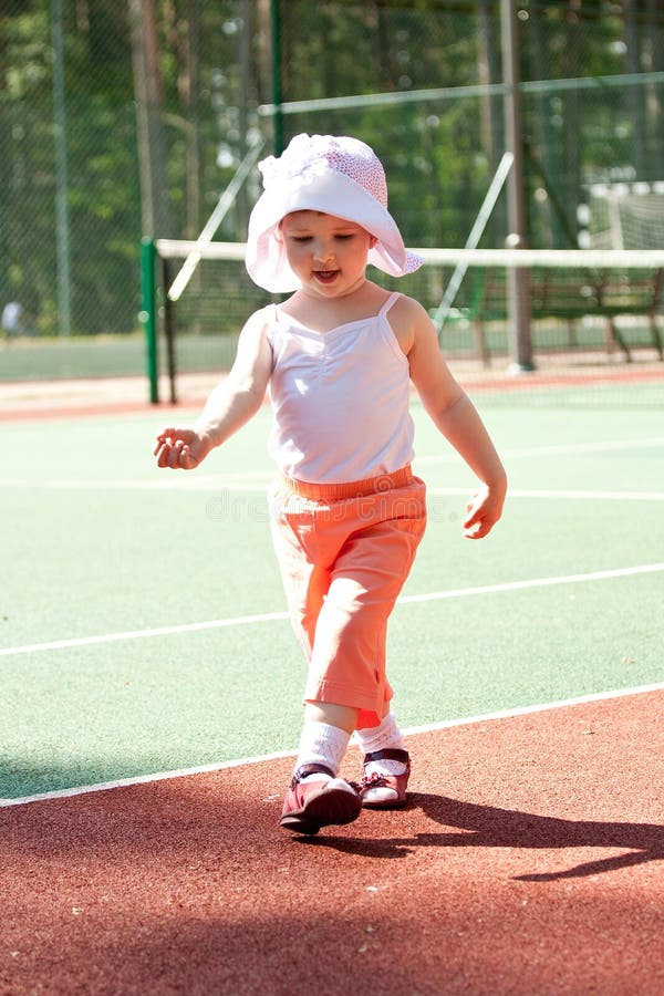 Active Child Walking in a Stadium Stock Photo - Image of happy ...