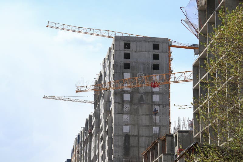Active Construction of a Large Residential Complex. Construction Cranes ...