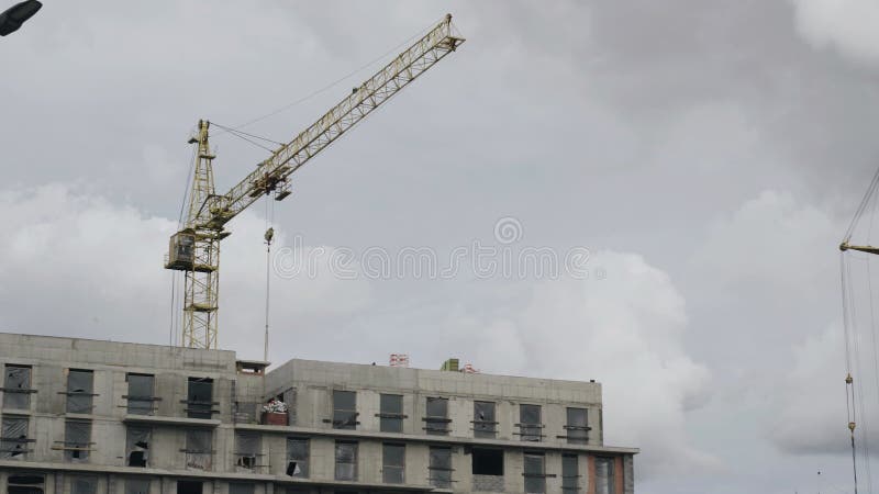 Construction Site in Urban Area with Crane Working on New Building ...