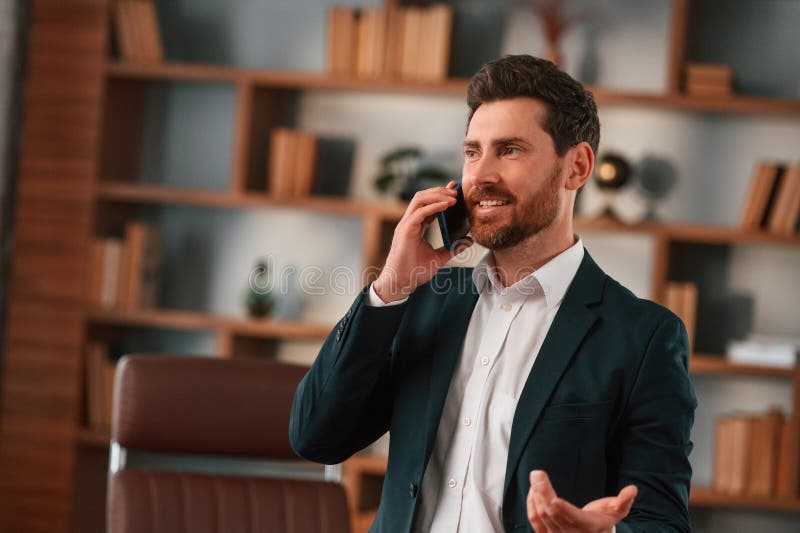 Active Conversation by Phone. Businessman in Formal Clothes is Working ...