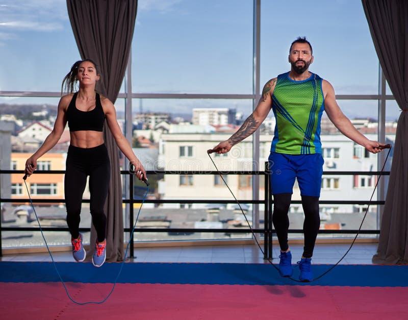 Active Couple Doing Workout Together Stock Photo - Image of dumbbells ...