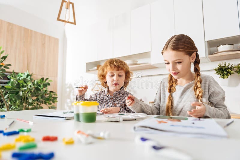 Active Determined Children Deciding on What To Draw Next Stock Photo ...