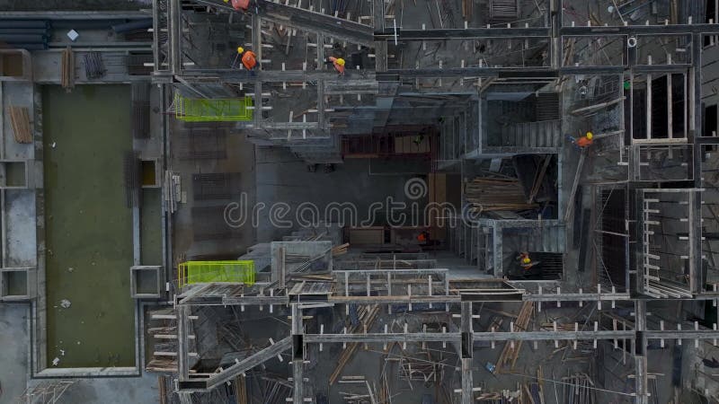 Aerial Video: Aerial Perspective of Workers Handling Metal and ...