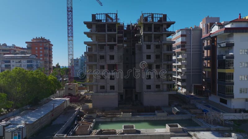 Aerial Video: Aerial Perspective of Construction Progress with Workers ...