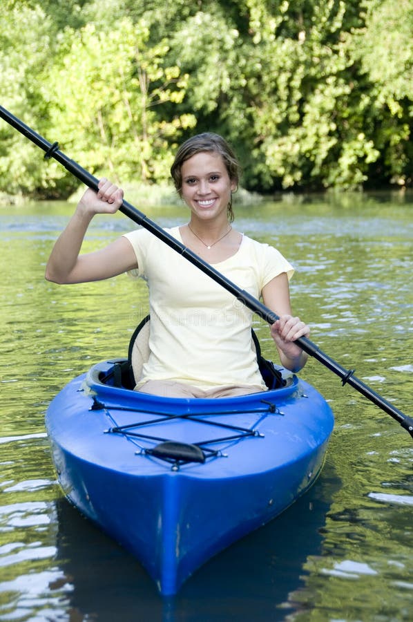 Active female in Kayak stock image. Image of pursuit - 15239285
