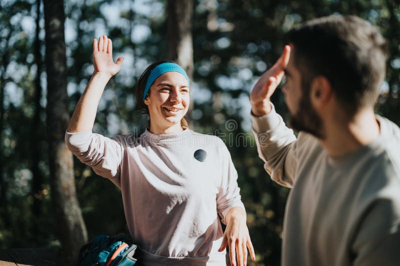 Active Friends Hike through the Autumn Forest, Enjoying Exercise and ...