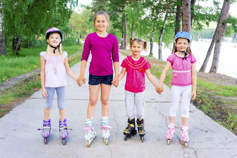 Active Kids on Rollerblades Stock Photo - Image of outdoor, skateboard ...