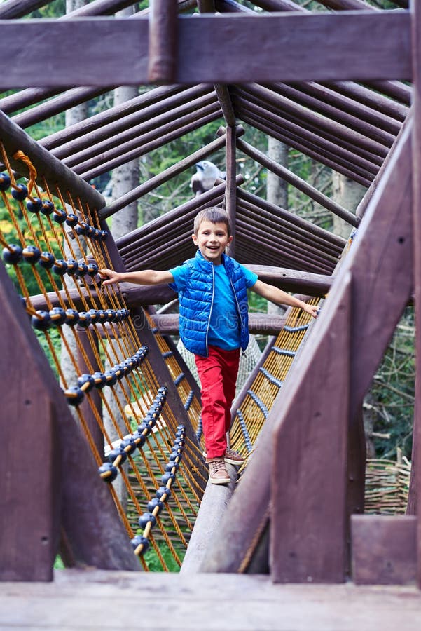 Active Little Boy at Climbing Net at Playground Stock Photo - Image of ...