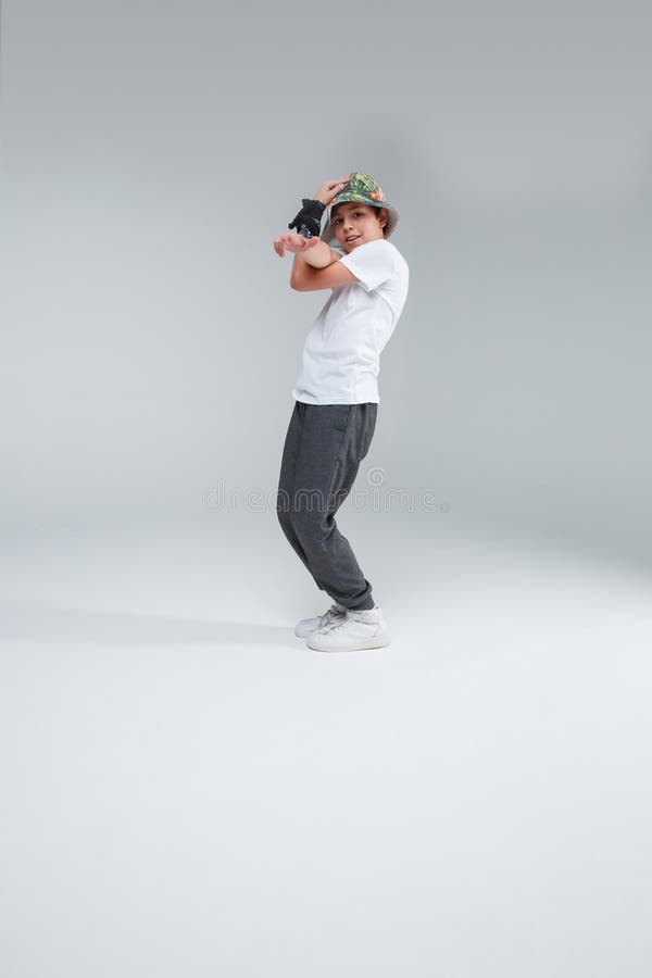Active Little Boy Dancer Breakdance, Doing a Gesture with His Hands ...