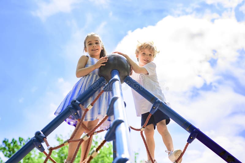 Active Little Girl and Boy Having Fun on Playground Stock Image - Image ...