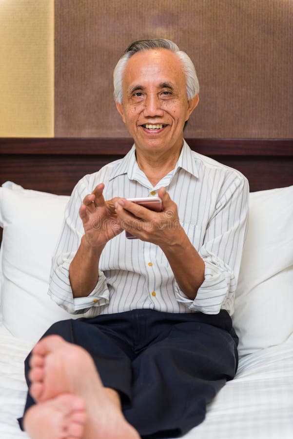 Active male senior smiling stock photo. Image of modern - 67406506