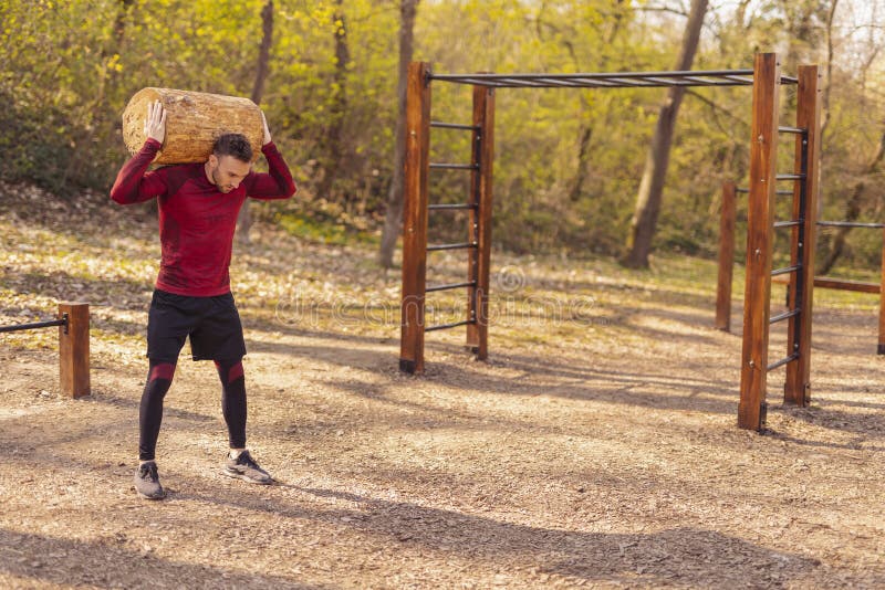 Active Man Doing Squats with Weights Outdoors Stock Photo - Image of ...