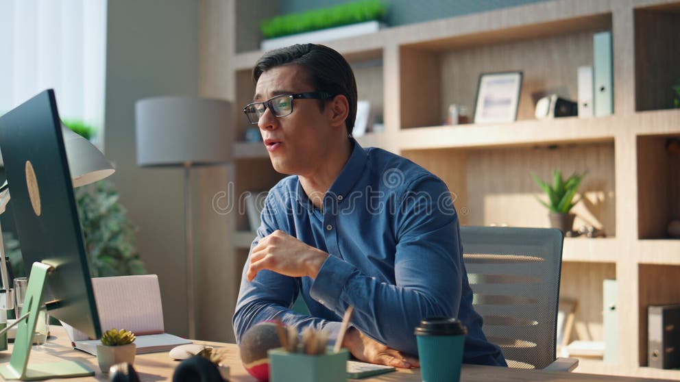 Active Man Explaining Computer Virtual Meeting at Home. Teacher ...