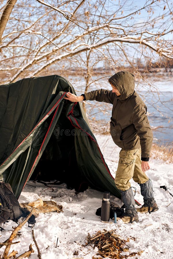 Man Hiker Setting Up Tent in Forest, Pitching in Forest Clearing ...