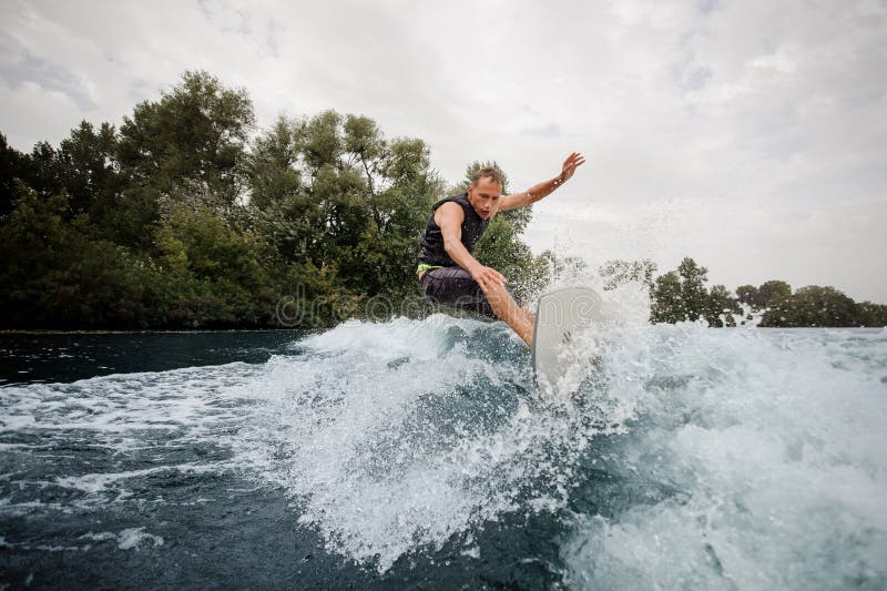 Side View Active Boy Riding on the White Wakeboard Stock Photo - Image ...
